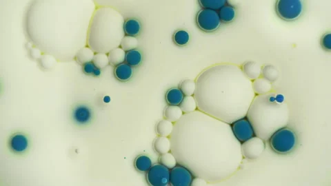 Various liquids mixing in an abstract ba... | Stock Video | Pond5