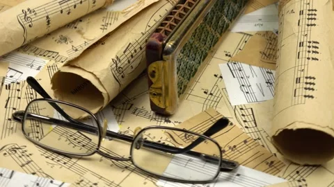 Various old sheets music and vintage har... | Stock Video | Pond5