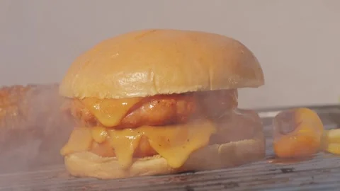 Veggie orange burger on grill, carrot an... | Stock Video | Pond5