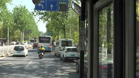 Vehicles outside the bus window A moving... | Stock Video | Pond5
