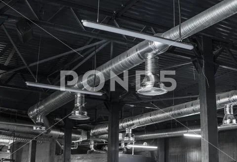 Ventilation system on the ceiling of large buildings. Ventilation pipes ...