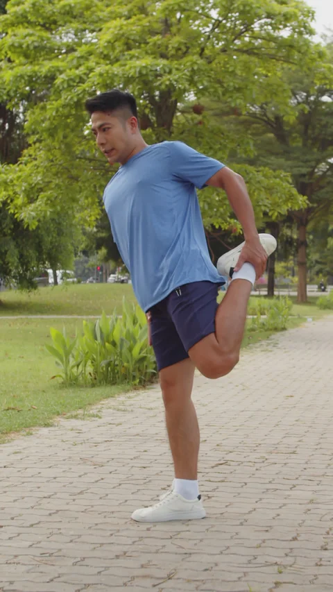 Vertical of Athlete Pulling Legs during ... | Stock Video | Pond5