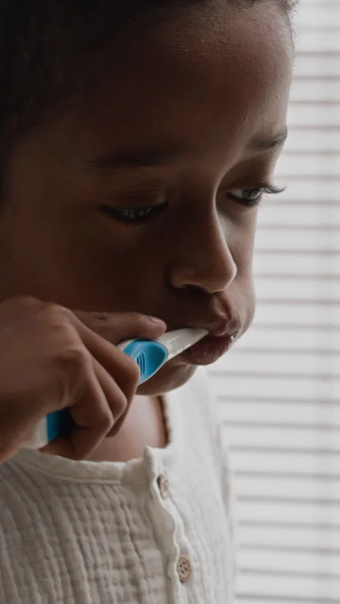 Vertical of Black Boy Brushing Teeth in ... | Stock Video | Pond5