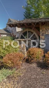 Vertical Blank sign on brick out building with wagon wheel Stock Photo ...