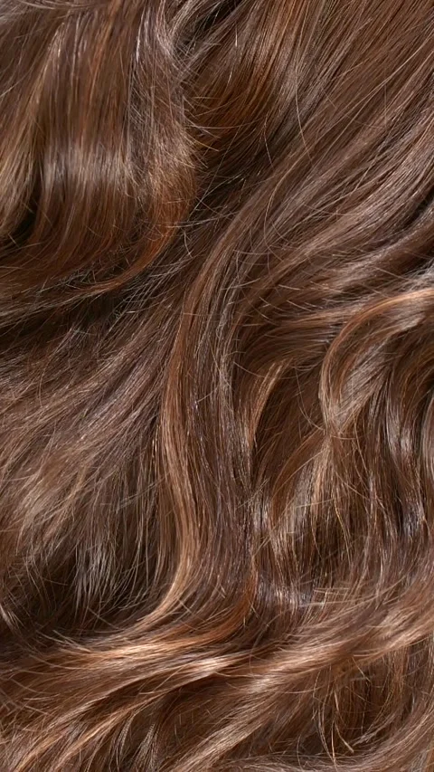 Vertical brown curly hair texture, close... | Stock Video | Pond5