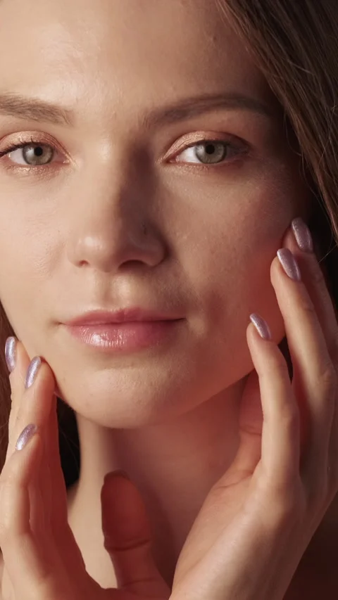 Vertical face moisturizing woman touchin... | Stock Video | Pond5