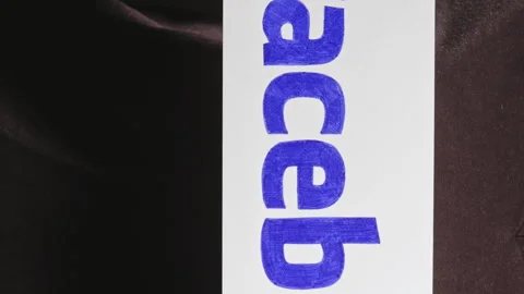 Vertical facebook logo social media hand... | Stock Video | Pond5