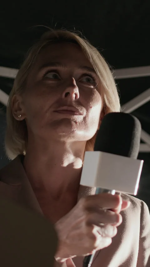 Vertical of Female Reporter Interviewing... | Stock Video | Pond5