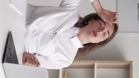 Vertical hot day working woman heat suff... | Stock Video | Pond5