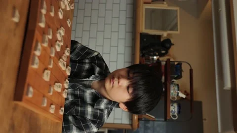 Vertical : Japanese boy playing Shogi, J... | Stock Video | Pond5