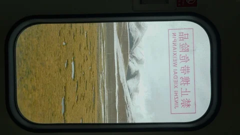 VERTICAL: Oval shaped train window offer... | Stock Video | Pond5