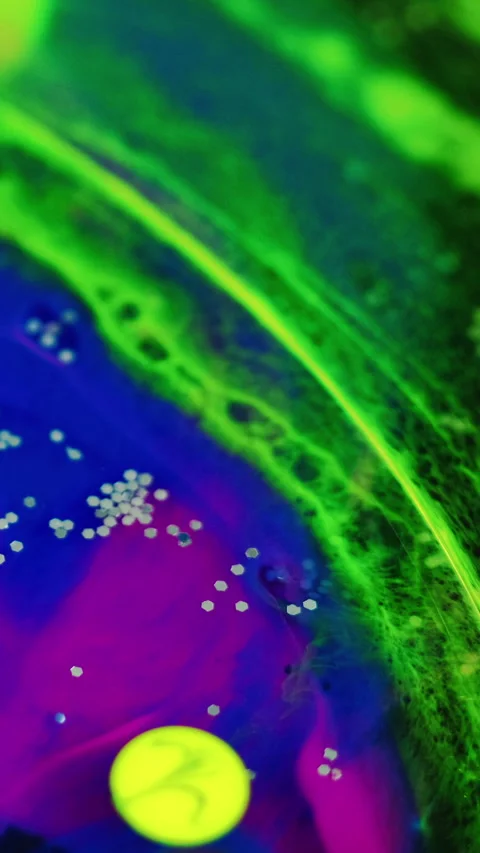 Vertical paint splash neon ink blob colo... | Stock Video | Pond5