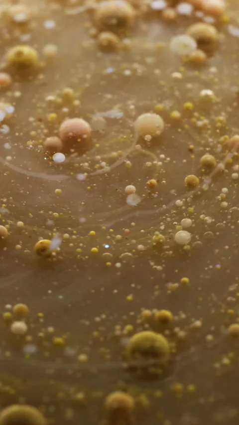 Vertical paint vortex oil drop flow marb... | Stock Video | Pond5