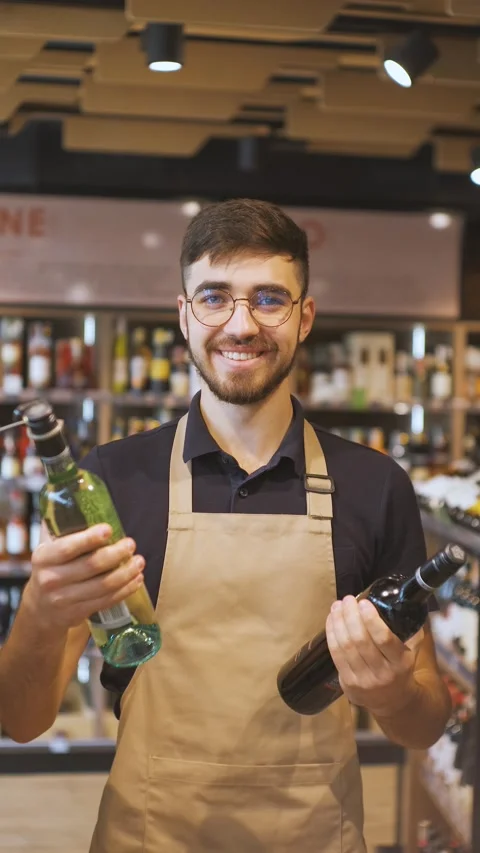Vertical Portrait of man worker in a liq... | Stock Video | Pond5