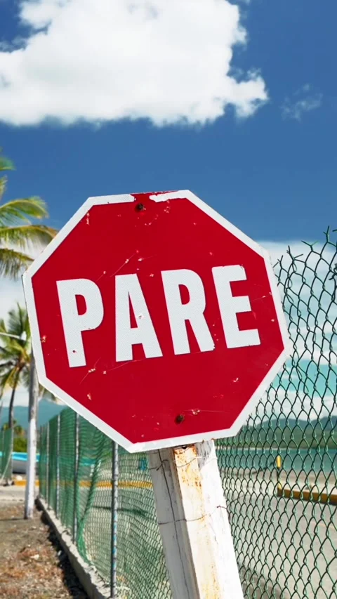 Vertical red stop sign slow motion, trop... | Stock Video | Pond5