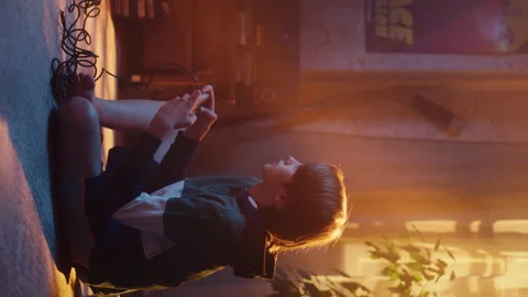 Vertical Screen Boy Playing Nostalgic Ar... | Stock Video | Pond5