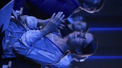 Vertical Screen Female Clapping at Crowd... | Stock Video | Pond5