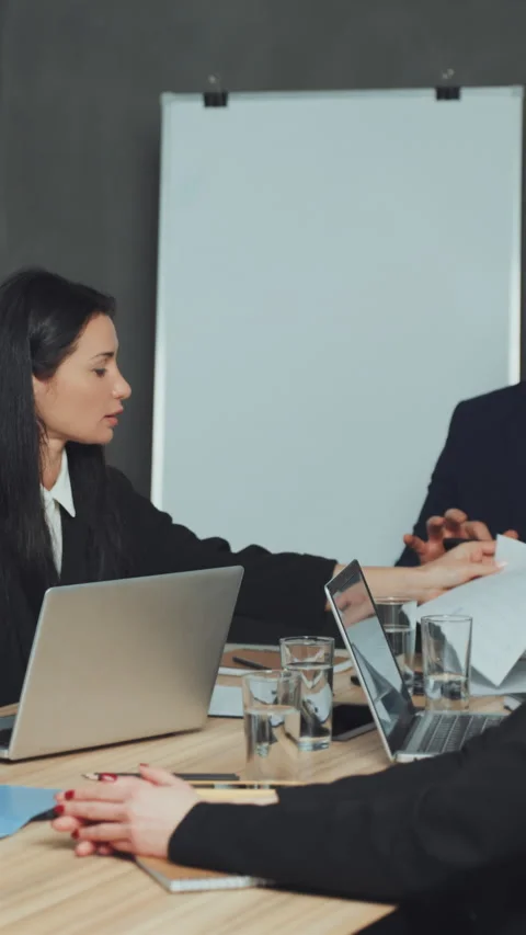 Vertical screen: Handshake During Contra... | Stock Video | Pond5