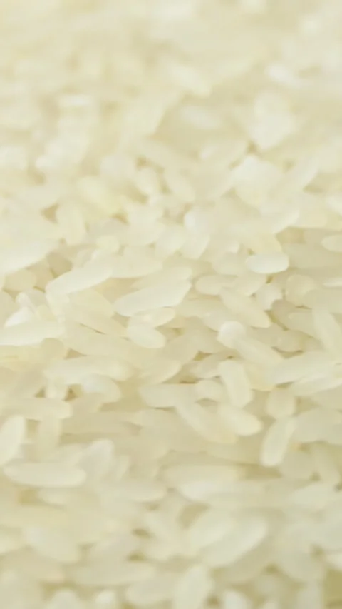 Vertical Screen: Macro white raw rice te... | Stock Video | Pond5