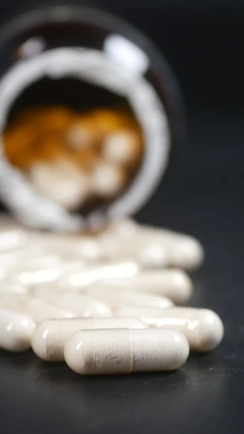 vertical shot pf herbal medicine capsule... | Stock Video | Pond5