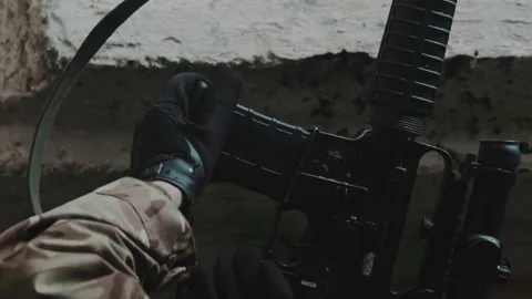Vertical shot Soldier loading the magazi... | Stock Video | Pond5