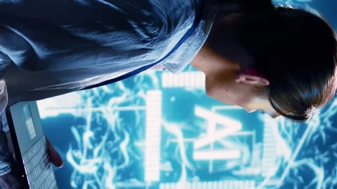 Vertical video AI operator runs code in ... | Stock Video | Pond5