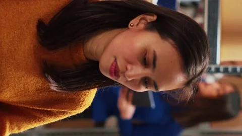 Vertical video: Asian woman planning ord... | Stock Video | Pond5