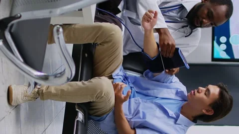 Vertical video: Cardiologist using medic... | Stock Video | Pond5