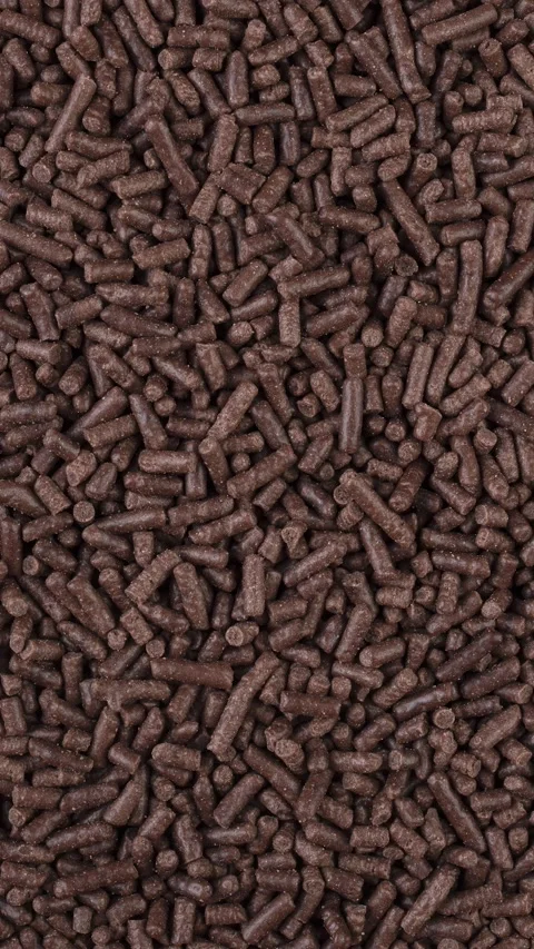 Vertical video. Dark chocolate sprinkles... | Stock Video | Pond5