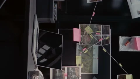 Vertical video: Detective evidence map w... | Stock Video | Pond5