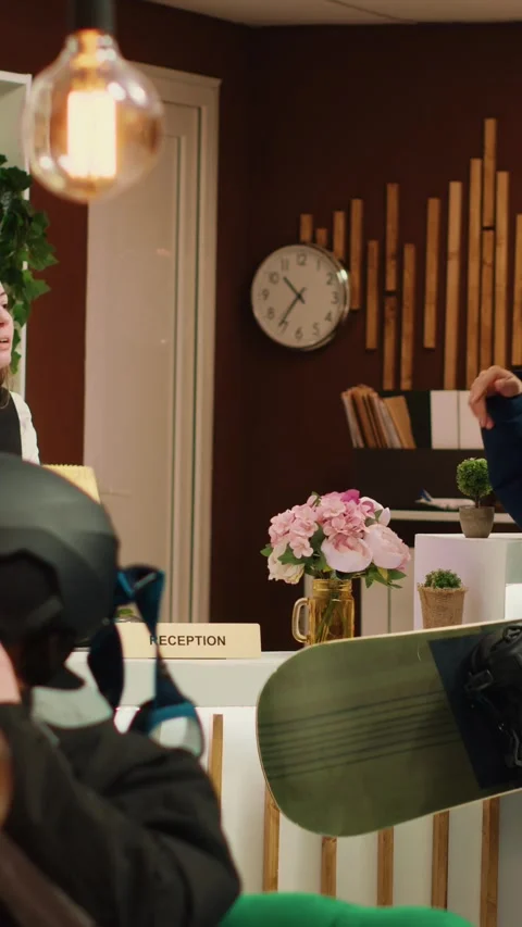 Vertical Video Employee giving direction... | Stock Video | Pond5