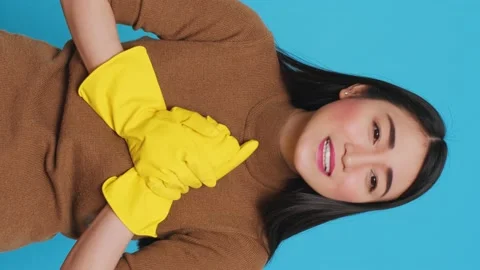 Vertical video: Happy professional maid ... | Stock Video | Pond5