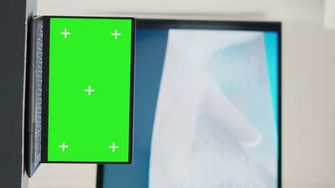Vertical video: Laptop with greenscreen ... | Stock Video | Pond5