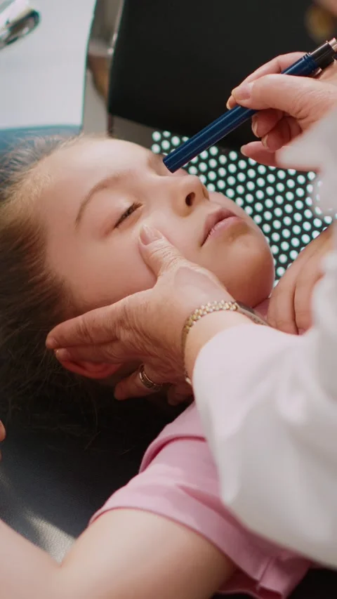 Vertical video: Little kid fainting in h... | Stock Video | Pond5