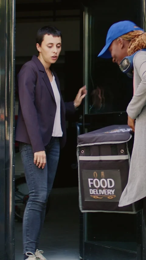 Vertical video: Pizzeria delivery worker... | Stock Video | Pond5