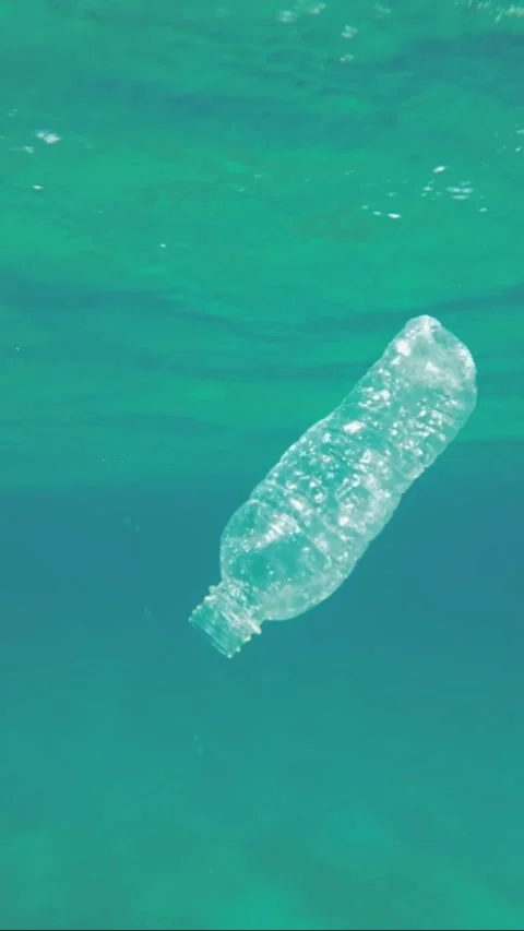 VERTICAL VIDEO: Plastic pollution, plast... | Stock Video | Pond5
