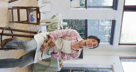 Vertical video of portrait of happy bira... | Stock Video | Pond5