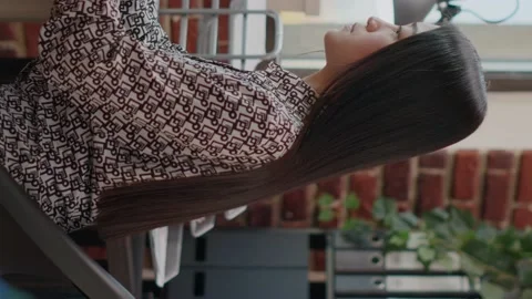 Vertical video: Portrait of person desig... | Stock Video | Pond5