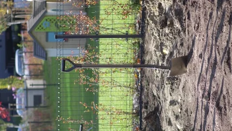 Vertical video of shovel on the ground i... | Stock Video | Pond5