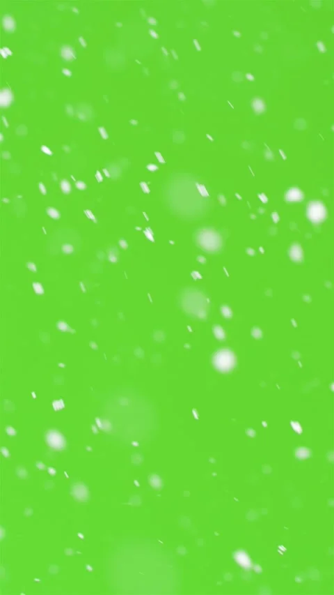 Vertical video of snow snowing on green ... | Stock Video | Pond5