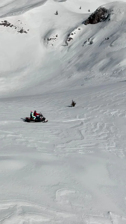 Vertical Video Snowmobile high in the mo... | Stock Video | Pond5