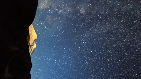 Vertical video. Stars draw fading lines ... | Stock Video | Pond5