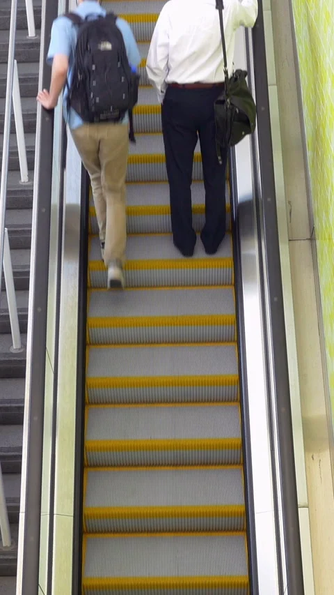 Vertical Video Top View People Riding Es... | Stock Video | Pond5