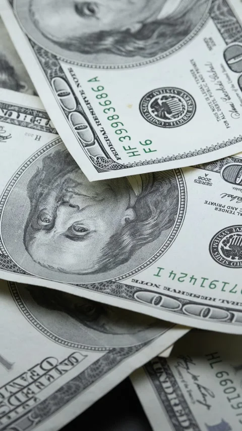 Vertical video of US currency - dollars ... | Stock Video | Pond5