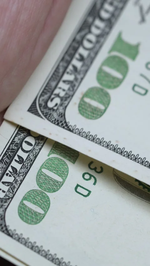 Vertical video of US currency - dollars ... | Stock Video | Pond5