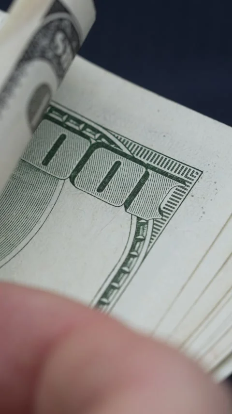 Vertical video of US currency - dollars ... | Stock Video | Pond5