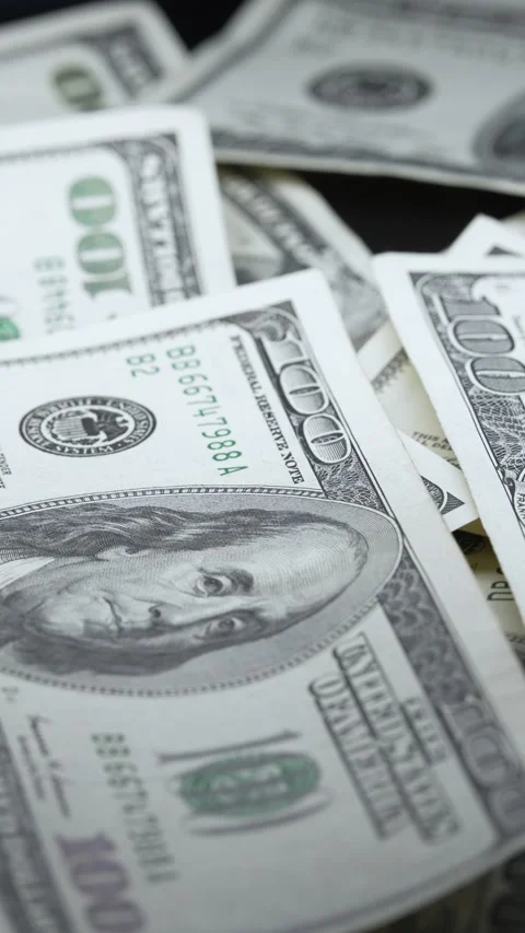 Vertical video of US currency - dollars ... | Stock Video | Pond5