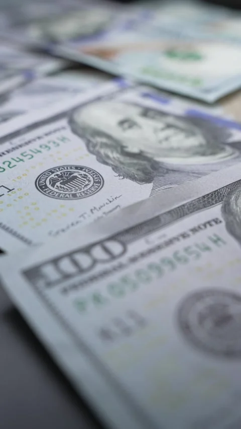 Vertical video of US currency - dollars ... | Stock Video | Pond5