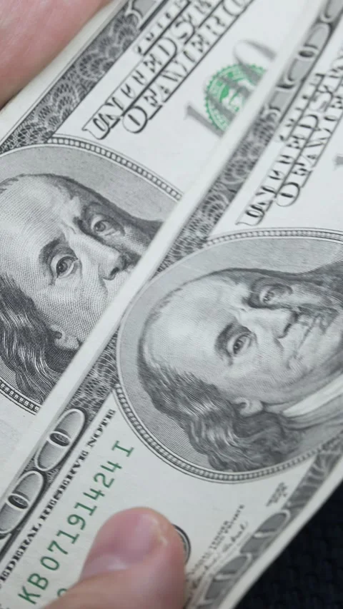 Vertical video of US currency - dollars ... | Stock Video | Pond5