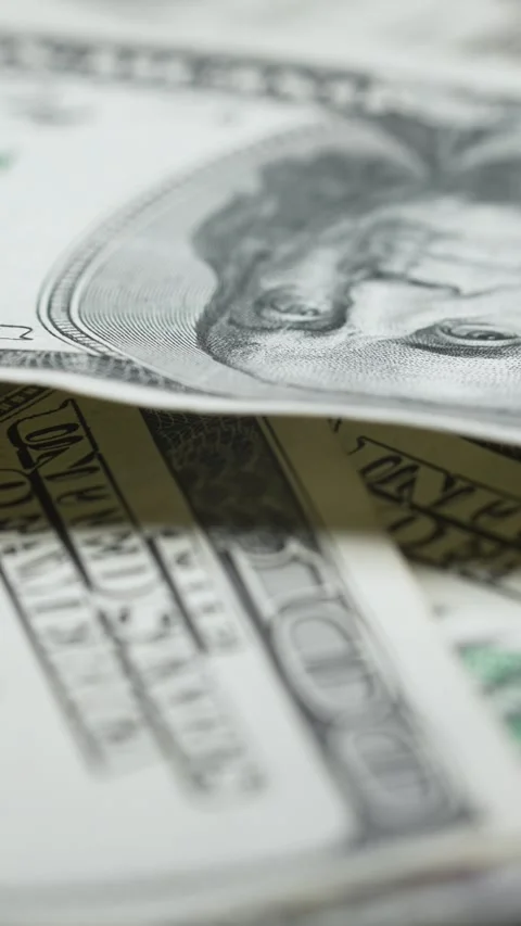 Vertical video of US currency - dollars ... | Stock Video | Pond5